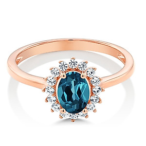 Gem Stone King 10K Rose Gold London Blue Topaz and White Created Sapphire Engagement Ring For Women | 1.14 Cttw | Oval 7X5MM | Gemstone Birthstone | Available in size 5, 6, 7, 8, 9