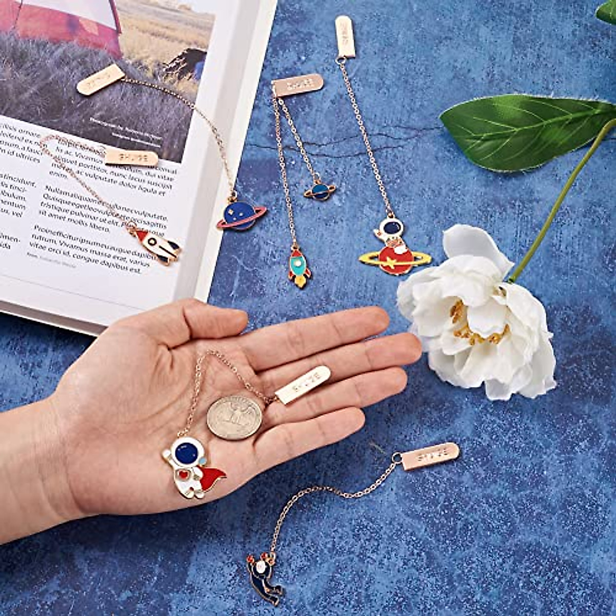 Beadthoven 8pcs Space Theme Metal Bookmarks with Chain Metal Enamel Charms Cute Astronaut Planet Rocket Metal Book Marker Page Clip Pendants for Student Kids School Office Book Reading Supplies