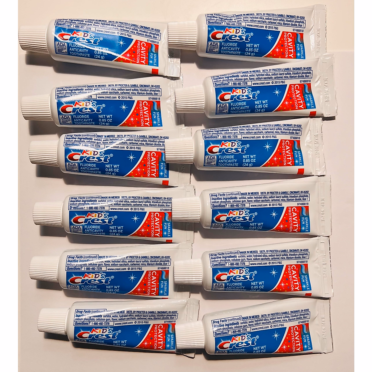 Kid’s Crest Cavity Protection Sparkle Fun Toothpaste .85 Ounce (12 Pack) | Sparkle Fun Flavor with Fluoride | Travel Size Anticavity Paste (B07NBR4LCB)