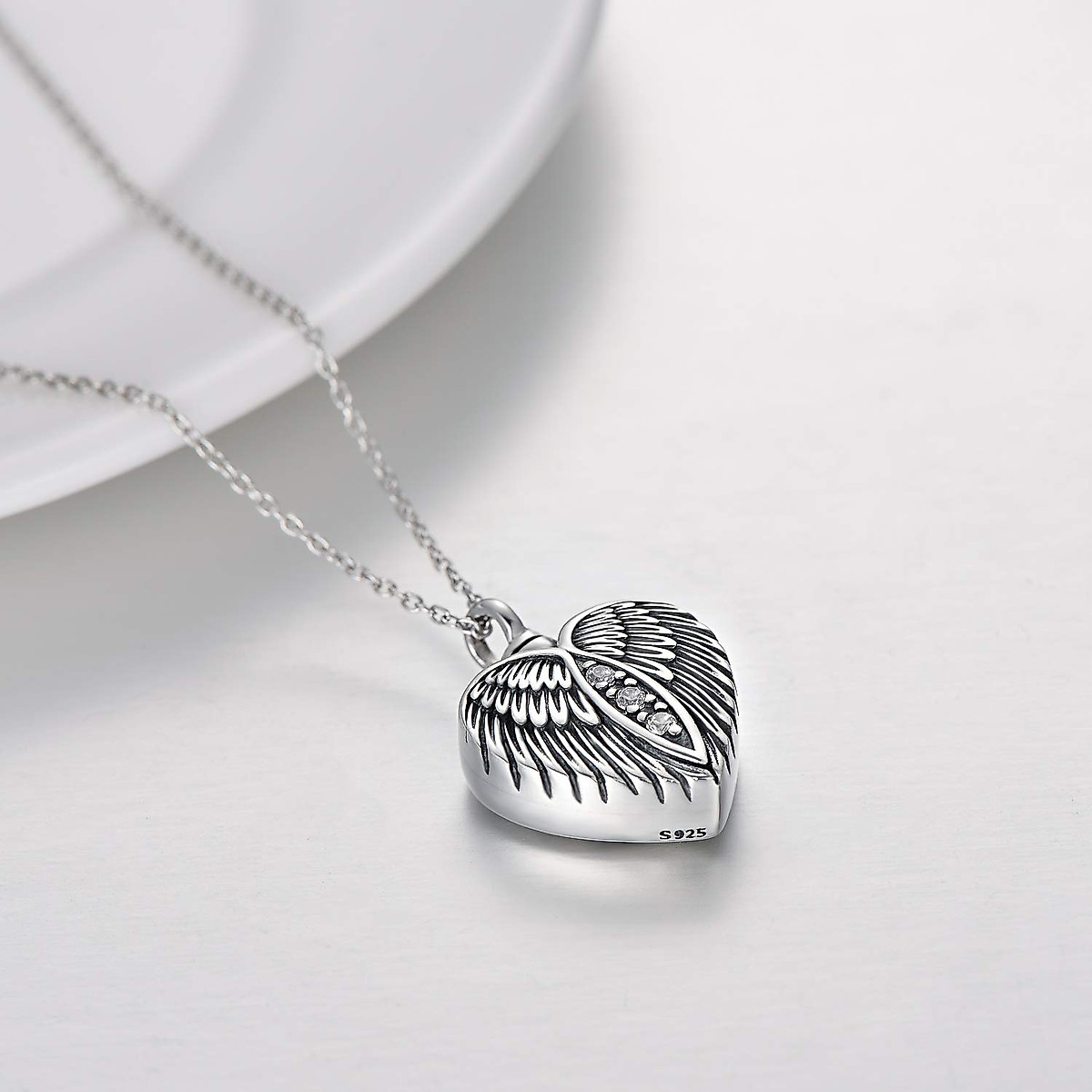 LONAGO Angel Wing Heart Urn Necklace for Ashes Silver Heart Wing Urn Necklace Keepsake Cremation Jewelry for Women