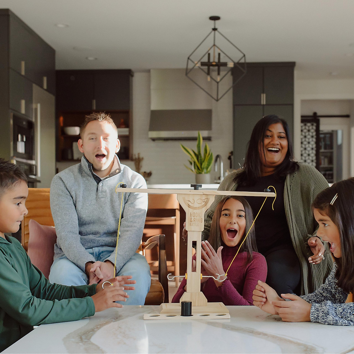 Buffalo Games - Hook and Ring Battle - Ultimate Fast Paced Party Game - Head to Head Game of Skill - Great Addition to Game Party - Bar Game - Ages 8 and Up