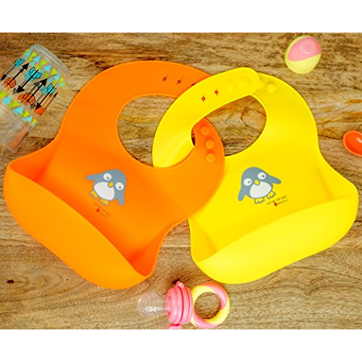 NatureBond Quirky Penguin Baby Bibs, Silicone Bibs for Babies, Set of 2 w/Carry Pouch (Yellow & Tangerine) Waterproof Bibs. Baby Shower Gifts. Funny Baby Bib