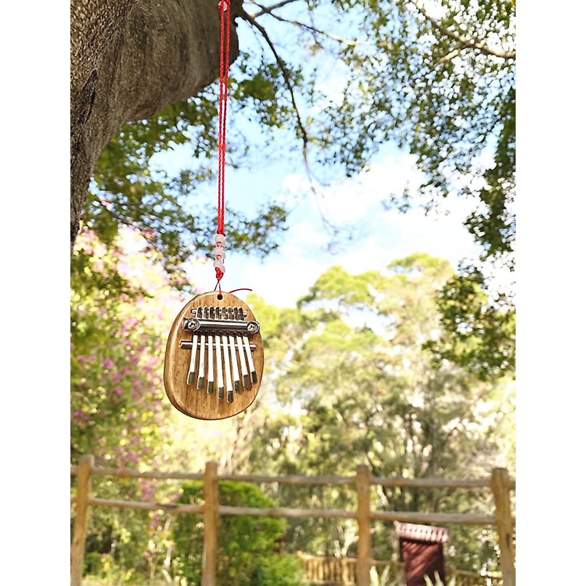 SLDHR Mini 8 keys Kalimba thumb piano, portable marimba music thumb piano pendant with lanyard, a unique gift for children, adults and beginners (Oval) (B11-1)