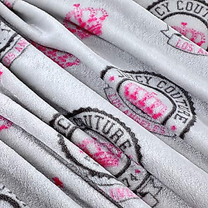 Juicy Couture – Throw Blanket | Juicy Emblem | Plush and Cozy | Decorative Blankets for Sofas, Chairs and Beds| Luxurious and Soft | Chic Home Décor | Measures 50” x 70” | Pink/Black/White