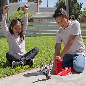 Evel Knievel Stunt Cycle - The Amazing Wind Up and Go Action Toy Launcher for Ultimate Jumps, Crashes, Flips and More - 8 Inch Bike Jumps Anywhere from 3 to 10 Feet - Original 1970's
