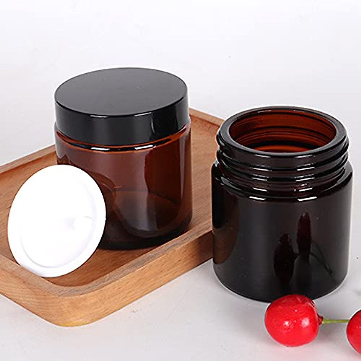 Homerove 4oz Amber Round Glass Jars with Black Lids and White Inner Liners, Empty Cosmetic Containers for Beauty Products(Set of 15 Pack and Attached with Labels and Spoons)