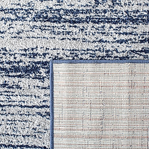SAFAVIEH Adirondack Collection Area Rug - 9' x 12', Navy & Grey, Modern Ombre Design, Non-Shedding & Easy Care, Ideal for High Traffic Areas in Living Room, Bedroom (ADR113E)
