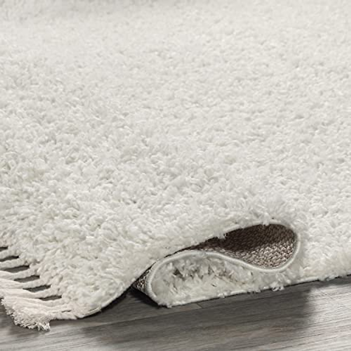 nuLOOM Neva Modern Tasseled Shag Area Rug, 5' 3" x 7' 7", Ivory