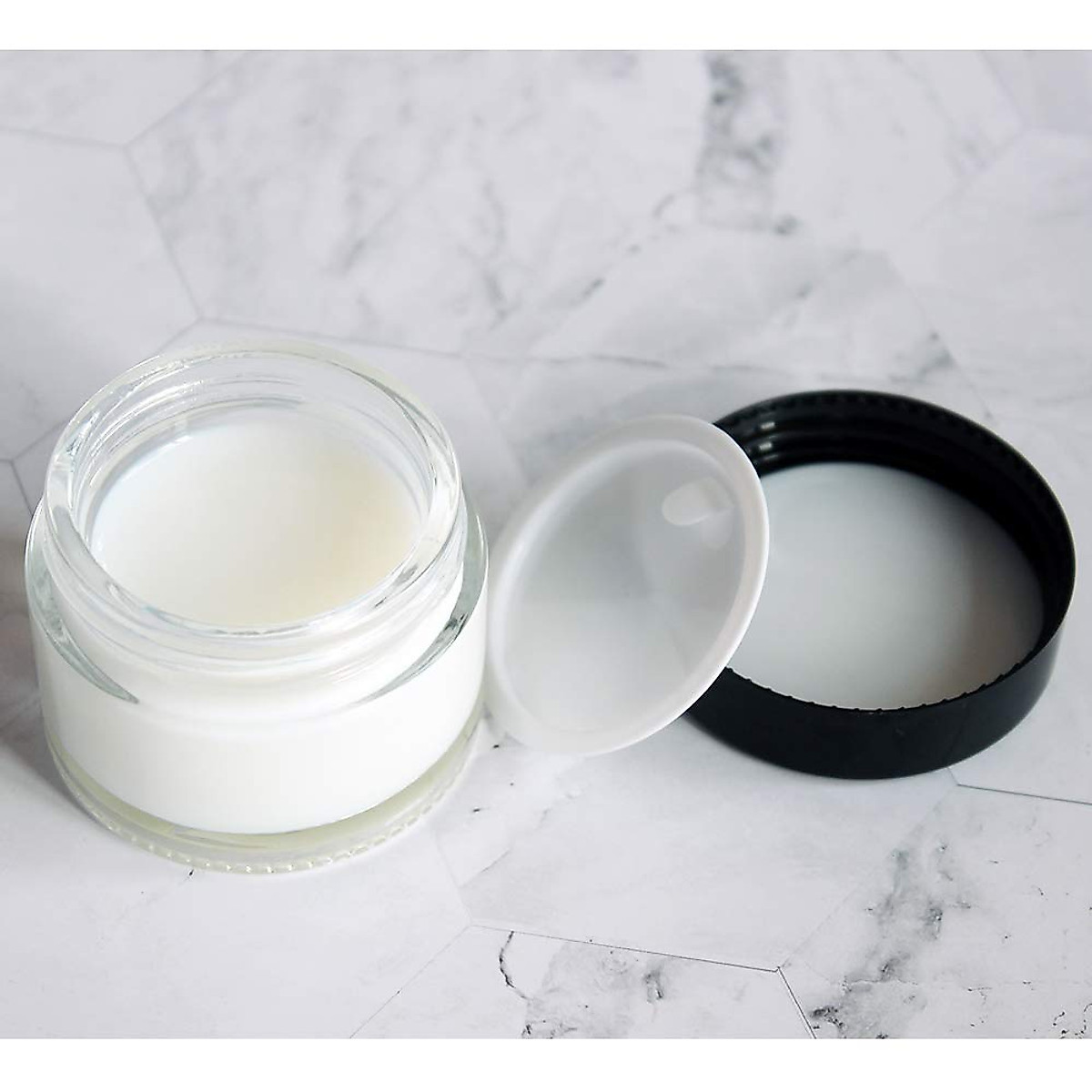 BPFY 24 Pack 2 oz Round Clear Glass Cosmetic Jars with Inner Liners and Black Lids, Travel Jars, Refillable Containers for Makeup, Cream, Lotion, Sugar Scrubs, Eye Shadow, Slime, Paint, Jewelry