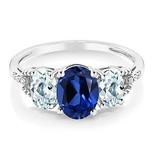 Gem Stone King 10K White Gold Blue Created Sapphire Sky Blue Aquamarine and Diamond Accent 3-Stone Engagement Ring | 2.51 Cttw | 3 Stone Wedding Anniversary Promise Ring For Women (Size 6)