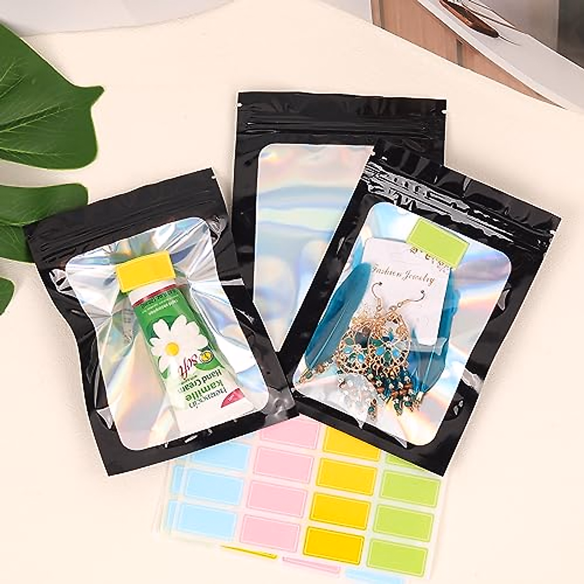 120 Resealable Mylar Bags, Smell Proof Bag for Food Storage, Holographic Packaging Pouch Bags with Front Window for Sample Snack Cookies Jewelry (4 x 6 Inch, Black)