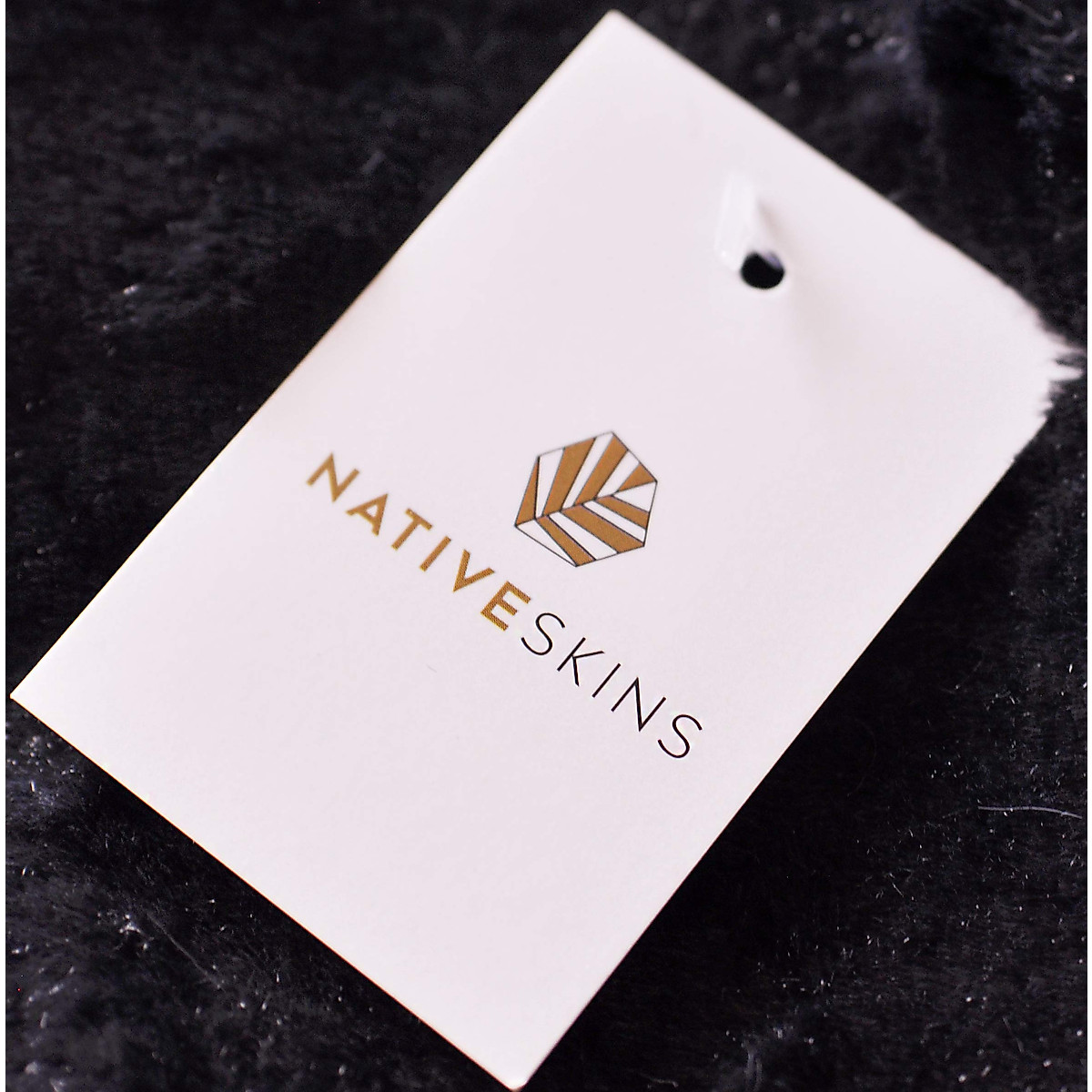 NativeSkins Faux Cowhide Rug (4.6ft x 5.2ft) - Cow Print Area Rug for a Western Boho Decor - Synthetic, Cruelty-Free Animal Hide Carpet with No-Slip Backing, Cow Print Rug