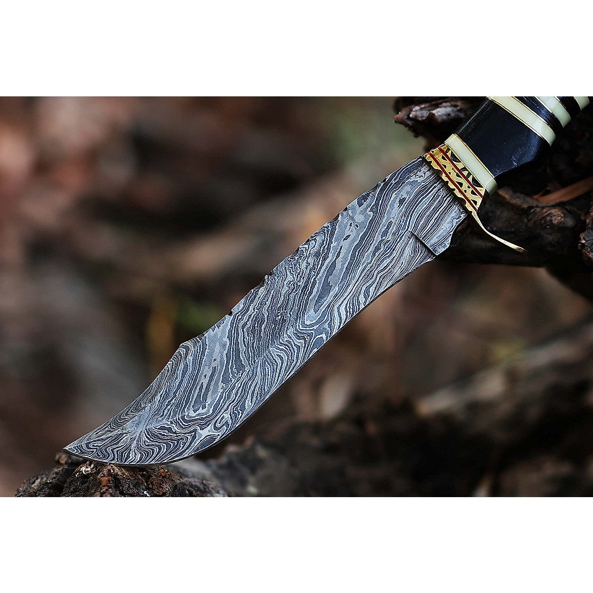 12.5 Inch long Hunting knife, Collectible knife, Scale is made of Camel bone and dollar wood, embellished with Engraved brass finger guard and pommel, Hand forged Twist pattern Damascus steel blade, Comes with Leather sheath
