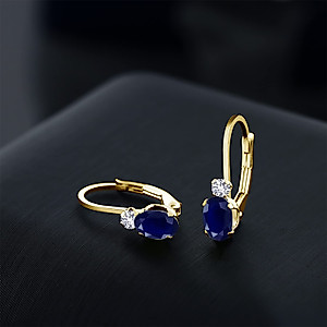 Gem Stone King 14K Yellow Gold Blue Sapphire and White Created Sapphire Leverback Earrings For Women | 1.18 Cttw | Gemstone September Birthstone | Oval 6X4MM, Round 2MM | 3/4 Inch