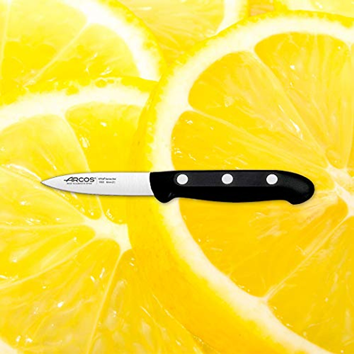 ARCOS Paring Knife 3 Inch Stainless Steel. Professional Kitchen Knife for Peeling Fruits and Vegetables. Ergonomic Polyoxymethylene Handle and 80mm Blade. Series Maitre. Color Black