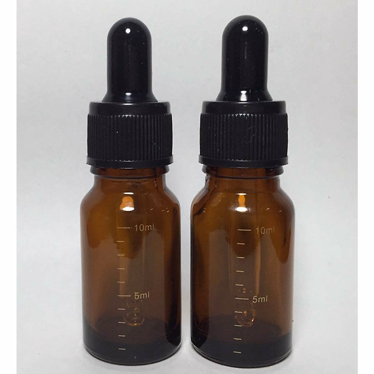 erioctry 6PCS 10ml 0.34oz Empty Refillable Amber Graduated Glass Essential Oil Bottle Vial Container with Glass Pipette Dropper