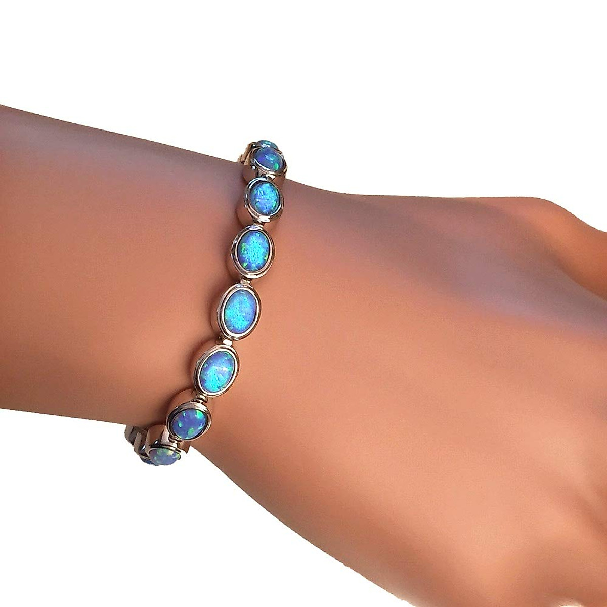 Paul Wright Created Blue Opal Bracelet in 925 Sterling Silver, 17 Oval Opal Links, with Vibrant Blue Color, 7" plus 1" extender