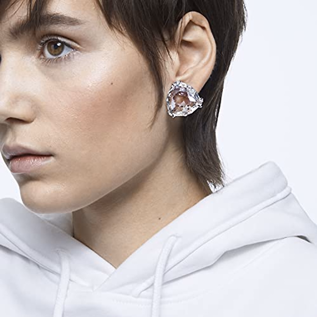 SWAROVSKI Mesmera Clip Earring, Large and Clear Trillion Cut Crystal with a Rhodium Finish Setting, Part of the Swarovski Mesmera Collection