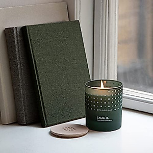 Skandinavisk Skog 'Forest' Scented Candle. Fragrance Notes: Pine Needles and Fir Cones, Birch Sap and Lily of The Valley. 7.0 oz.