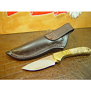Custom Leather Vertical Knife Sheath. The Sheath Is Made Out of 10 Ounce Water Buffalo Hide Leather with a Border Tooling Dyed Dark Brown. The Sheath Is Made Out of Water Buffalo Leather the Water Buffalo Leather Is Very Soft Pliable and Durable. The Shea