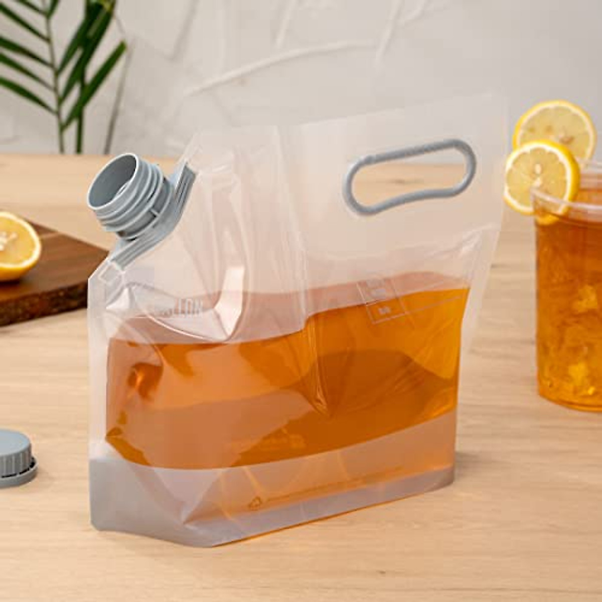 Restaurantware Cater Tek 1/2 Gallon Water Containers 10 Drink Bags - Collapsible Includes Tamper-Evident Caps Clear Plastic Beverage Bags For Catered Events Camping or Hiking Durable Handle