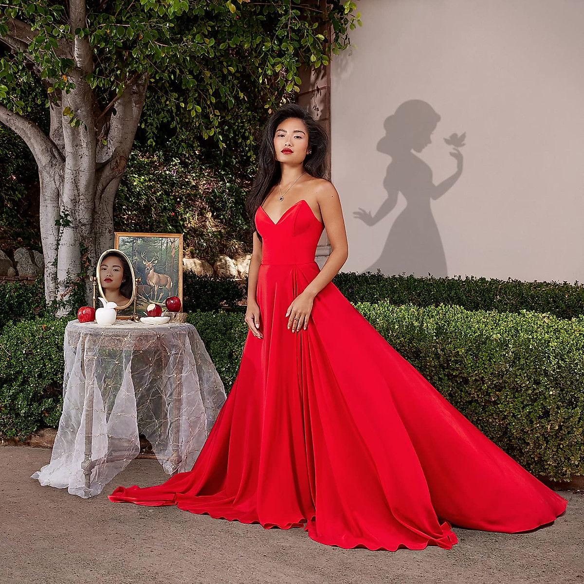 Jewelili Enchanted Disney Fine Jewelry Sterling Silver 8x6 MM Oval Cut Red Garnet and 1/6 Cttw Natural White Round Diamonds Snow White Bow Ring Size 5