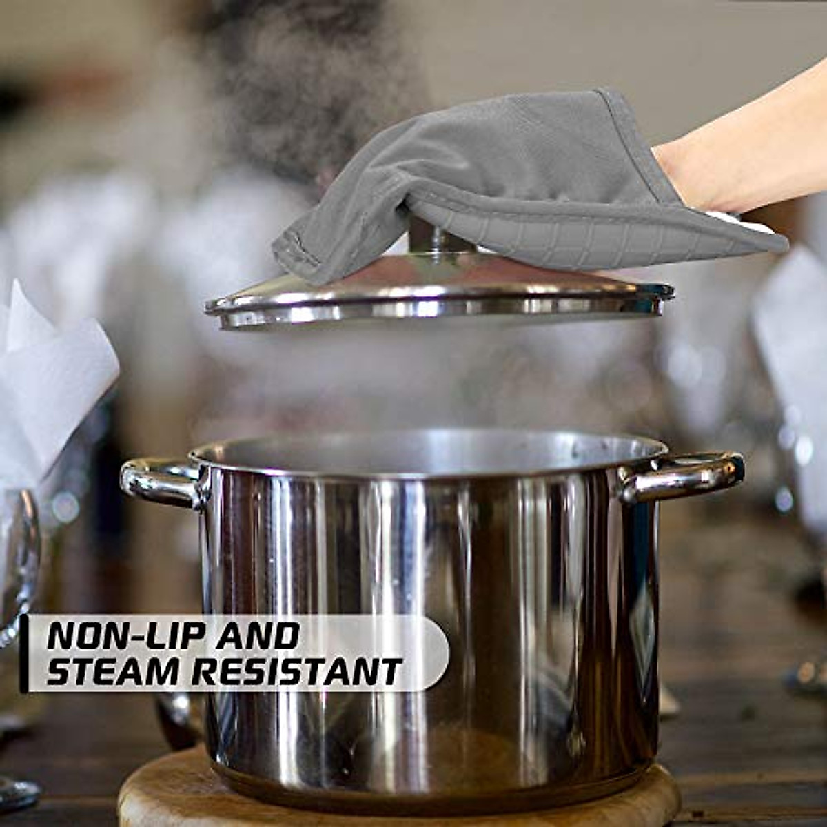 HOMWE Silicone Kitchen Pot Holders with Pockets, 2 Pc Set Trivet, Steam and Heat Resistant Hand and Countertop Protection Hot Pads, Non-Slip Grip potholders, Terrycloth Interior Lining, Black