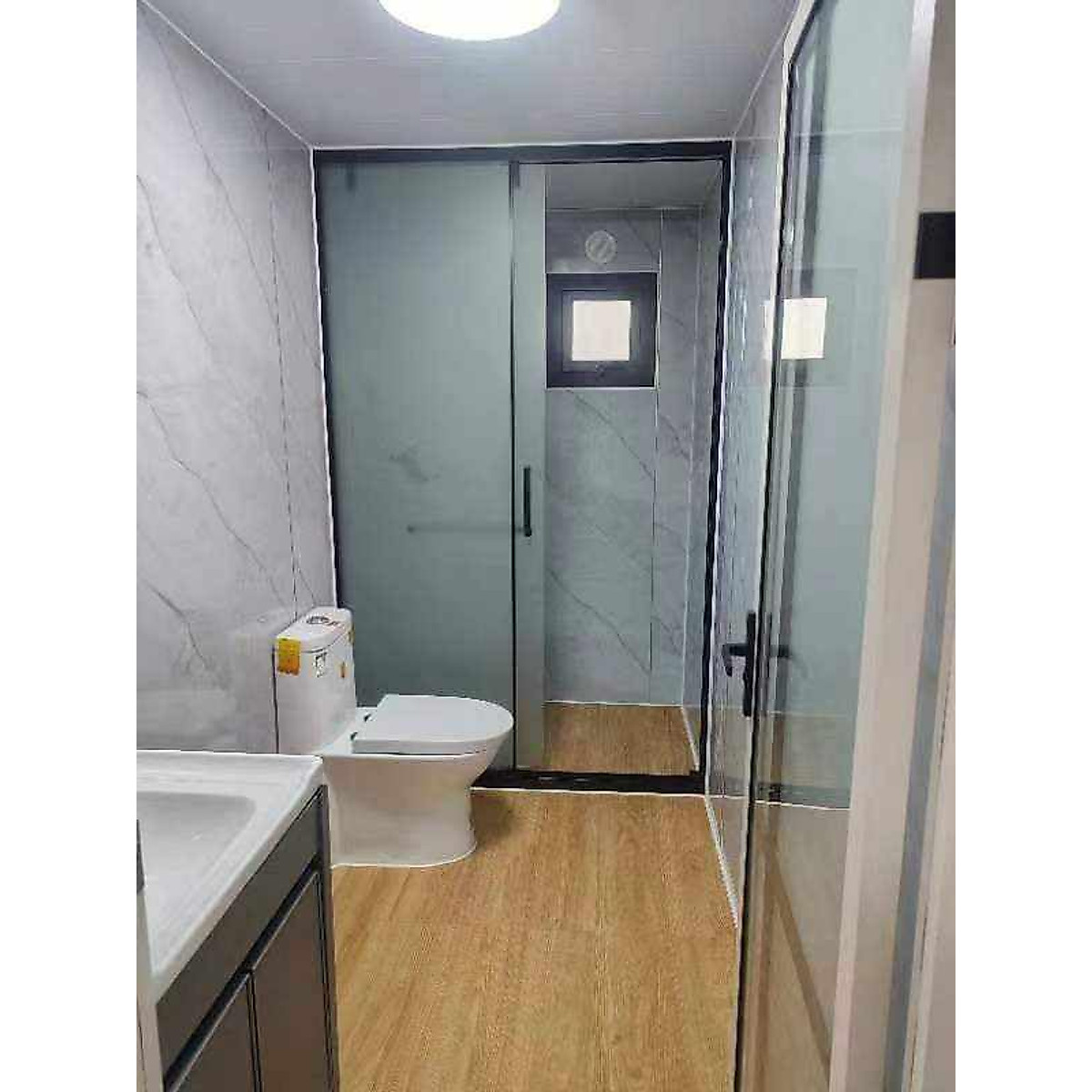 Elegant Prefabricated 30FT House with Spacious Living Area, 3 Bedroom,Fully Equipped Bathroom,Modern Kitchen and Steal Frame Construction- Ideal Mobile Home for Comfortable Living.