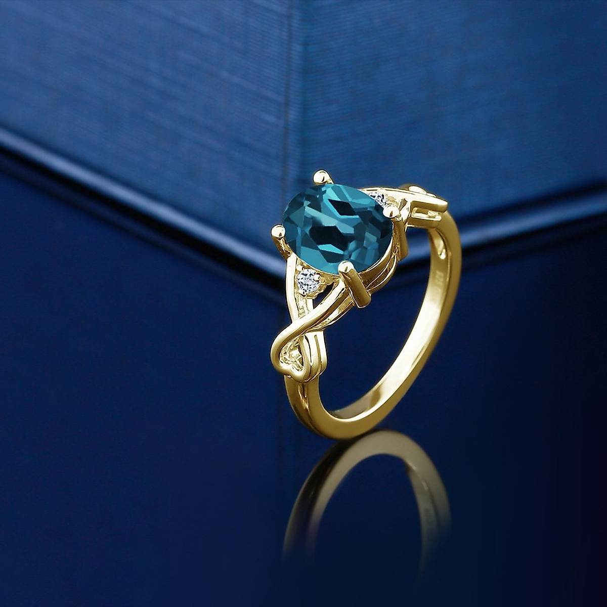 Gem Stone King 18K Yellow Gold Plated Silver London Blue Topaz and White Topaz Women Ring (1.85 Cttw, Oval 9X7MM, Gemstone Birthstone, Available In Size 5,6,7,8,9)