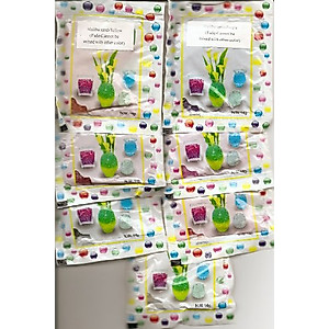 Malibu Sand ;7 Packs; 14g/pkg (Yellow,red,purple, Pink, Green,orange and Clear)+Includes (1) Crystal Soil Disney(tm) Character.