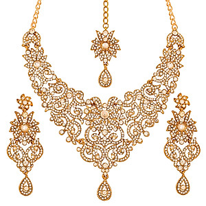 Touchstone Indian jewelry sets for women bollywood gold wedding bridal necklace desi earrings formal fancy rhinestone india designer jewellery punjabi white kundan tikka set in antique gold tone.