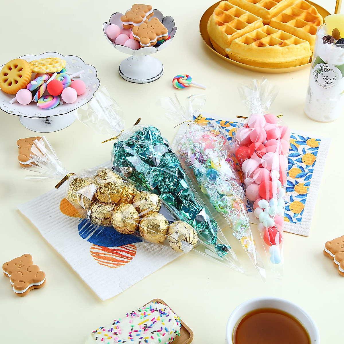 Outus 100 Pieces Christmas Medium Transparent Cone Bags Cello Bags Sweet Clear Treat Bags with 100 Pieces Twist Ties, 11.8 x 6.3 Inch (Gold Twist Ties)