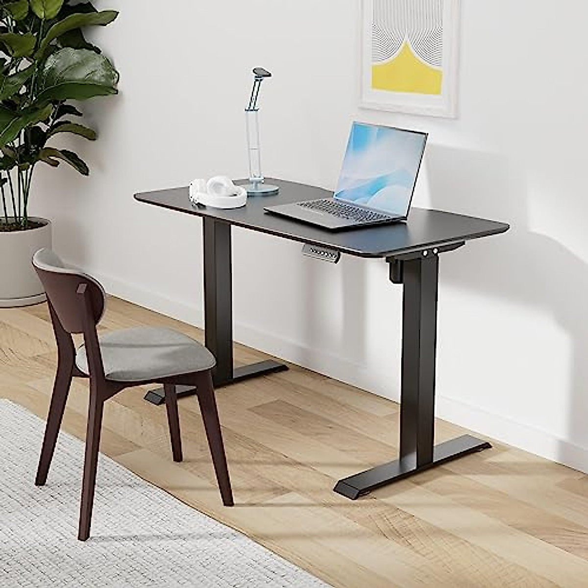 Vari Essential Height Adjustable Electric Standing Desk - Home Office Standing Desk with VariDesk Sturdy T-Legs - Quiet Motorized Standing Desk - 48x24 Inch Small Standing Desk - Black - 1 Box