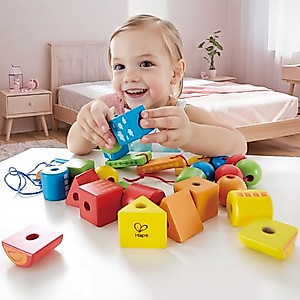 Hape String-Along Shapes | Classic 32 Piece Wooden Block Stacking Game, Multi-Colored Lacing Toy