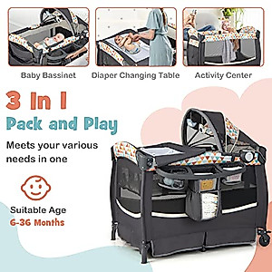 HONEY JOY Pack and Play with Bassinet, 4-in-1 Portable Baby Playard with Changing Table, Hanging Toys, Diaper Storage Bag, Music Box, Wheels with Brake, Foldable Newborn Play Yard w/Carry Bag (Yellow)