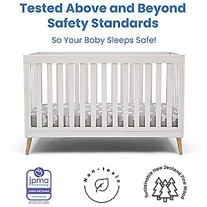 Delta Children Essex 4-in-1 Convertible Baby Crib, Bianca White with Natural Legs + Delta Children Twinkle Galaxy Dual Sided Recycled Fiber Core Crib and Toddler Mattress (Bundle)
