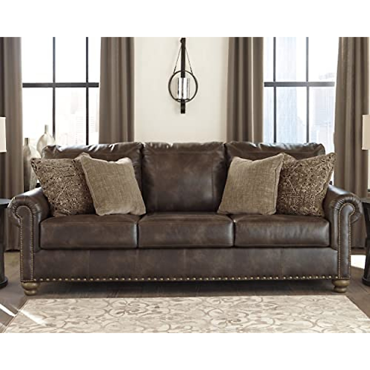 Signature Design by Ashley Nicorvo Traditional Faux Leather Sofa with Gold Nailhead Trim, Brown
