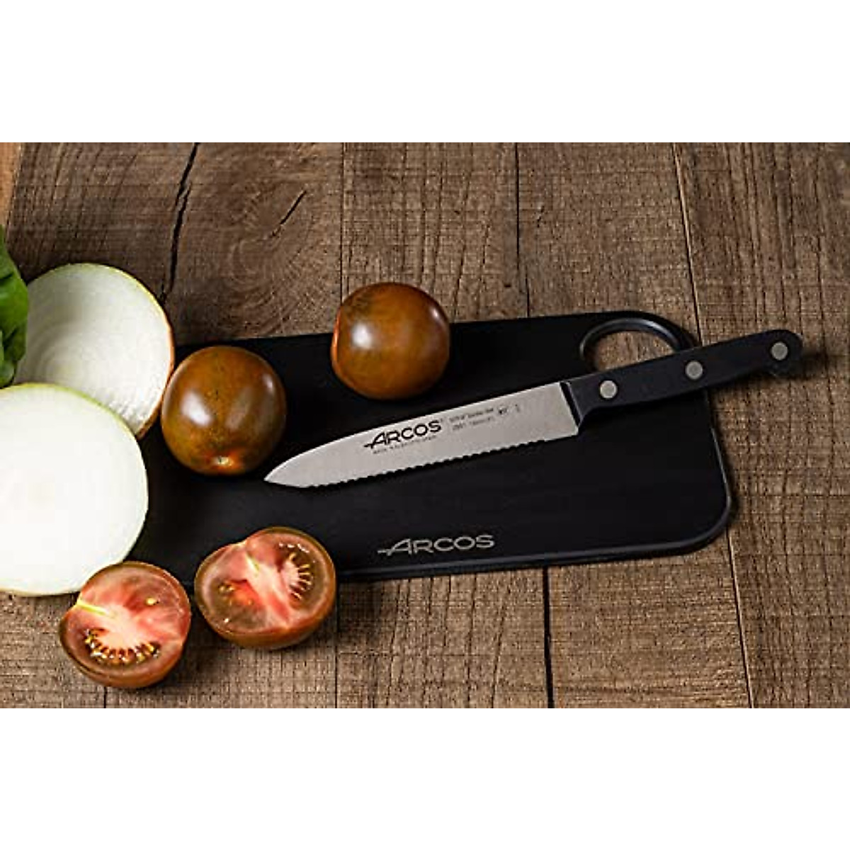 ARCOS Paring Knife 5 Inch Stainless Steel. Serrated Tomato Knife for Cutting and Chopping. Ergonomic Polyoxymethylene Handle and 130mm Blade. Series Universal. Color Black