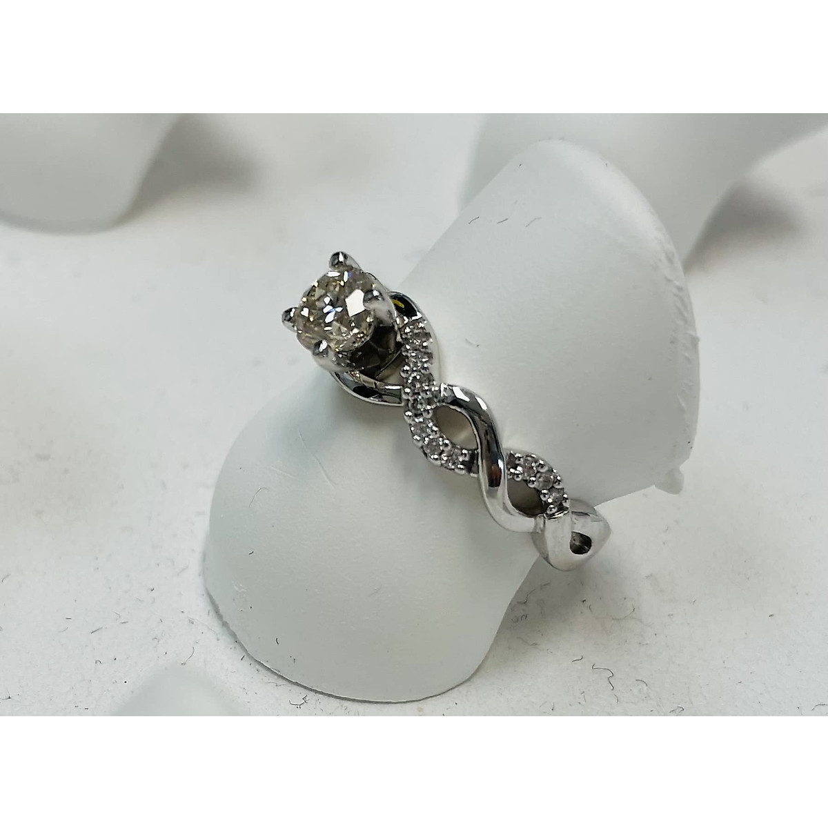 Houston Diamond District 0.63 Carat Twisting Infinity Gold and Diamond Split Shank Pave Set Diamond Engagement Ring, 14K Black Gold with a 0.5 Carat J-K I2 Round Brilliant Cut/Shape Center