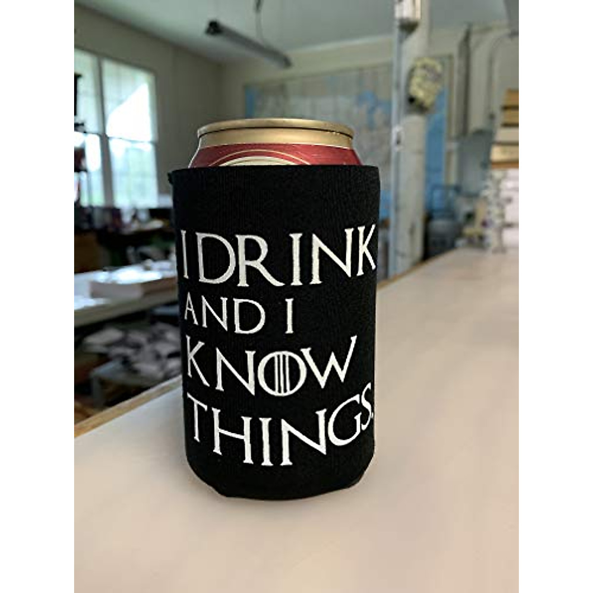 Cool Coast Products | Tyrion Lannister | Black Coolie | Drink and Know Things | Funny Novelty Hugger Coolie Huggie - Fantasy Drama Theme | Beer Gifts | Neoprene Can Cooler (Black Coolie)