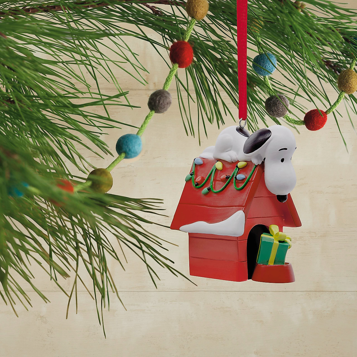 Hallmark Peanuts Snoopy on Holiday Doghouse Christmas Ornament