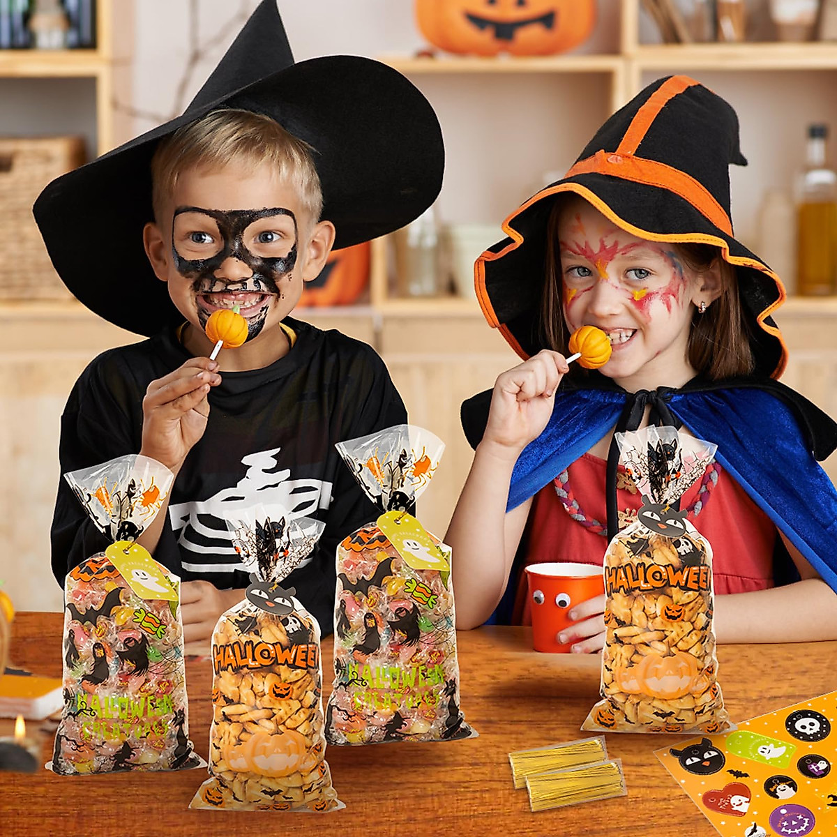 GOMANCHE Halloween Cellophane Treat Bags, 100 pcs Clear Halloween Goodie Bags with 100pcs Twists Ties, 4 Styles Halloween Cellophane Candy Bags with Gift Tag for Kids Halloween Party Supplies
