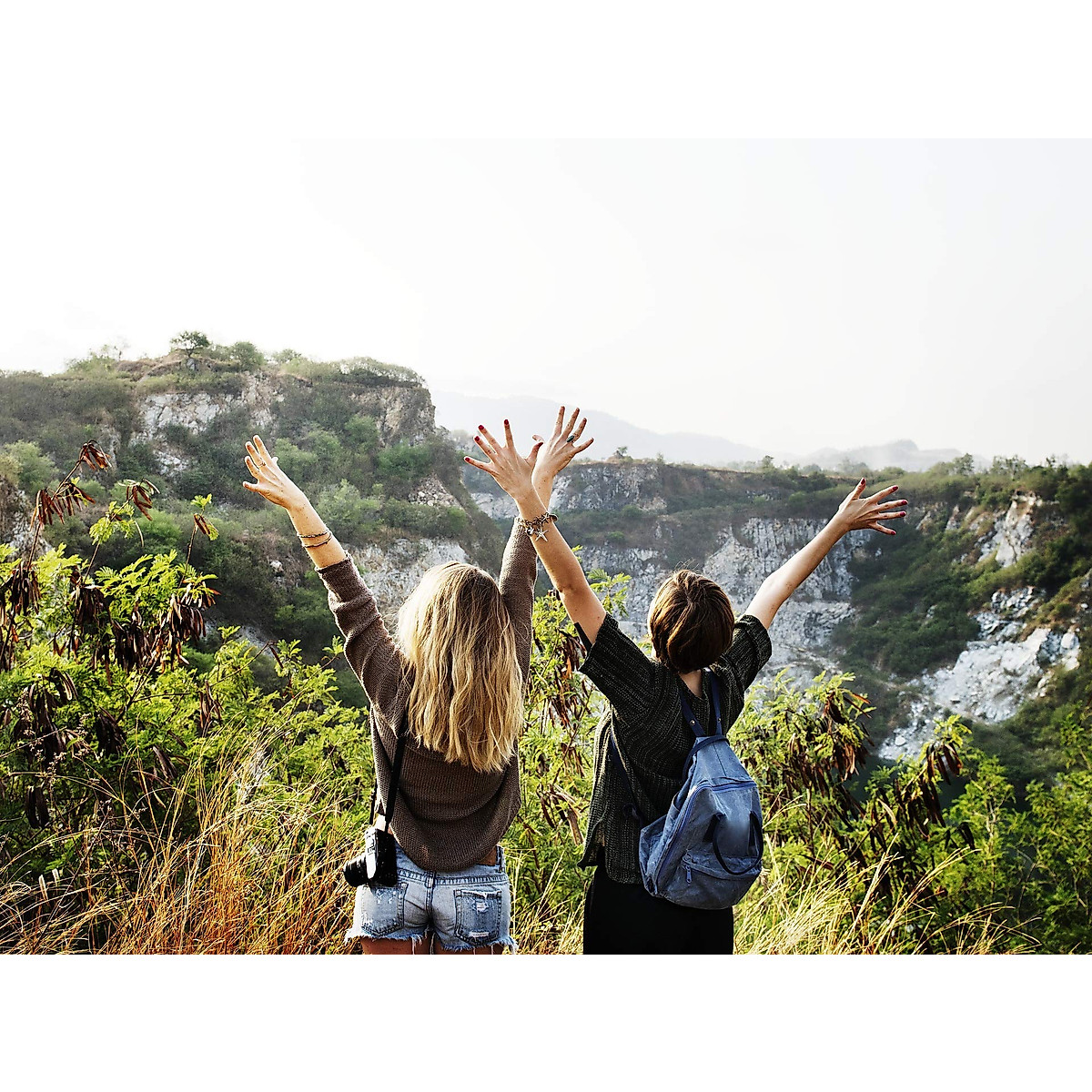 Uniden SX327-2CKHS Up to 32-Mile Range FRS Two-Way Radio Walkie Talkies, Dual Charging Cradle & 2 Headsets, Water Resistant, 22 Channels, 121 Privacy Codes, NOAA Weather + Alert, LED Flashlight