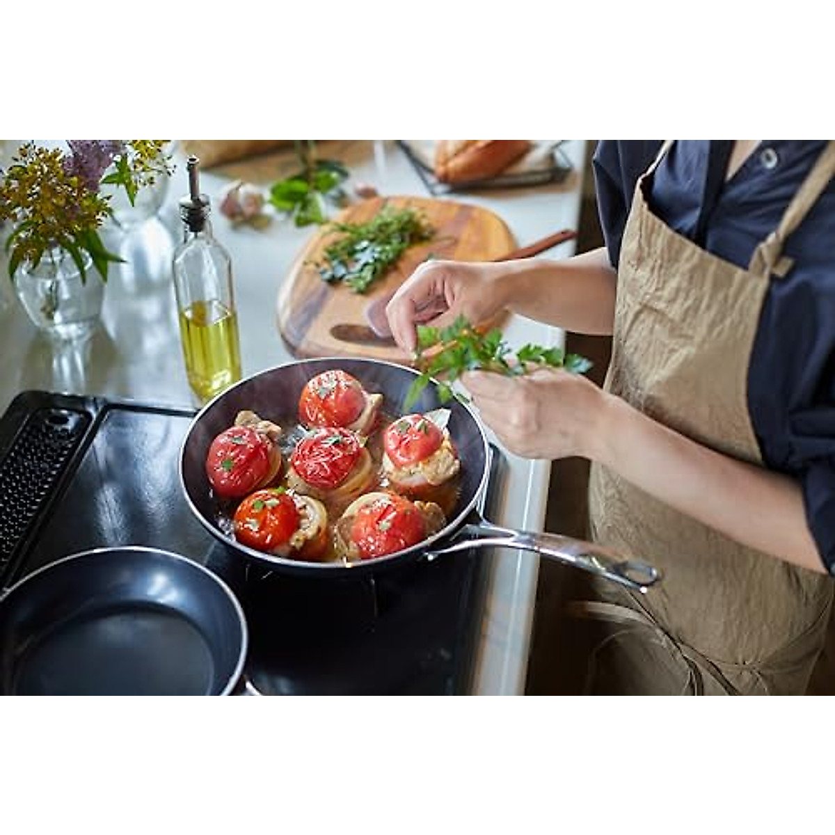 Kyocera Ceramic Cooking Pot with Ceramic Non-Stick Coating 24 cm PFAS/PTFE Free Stainless Steel Handles Suitable for All Hob Types Includes Glass Lid CSTP-09