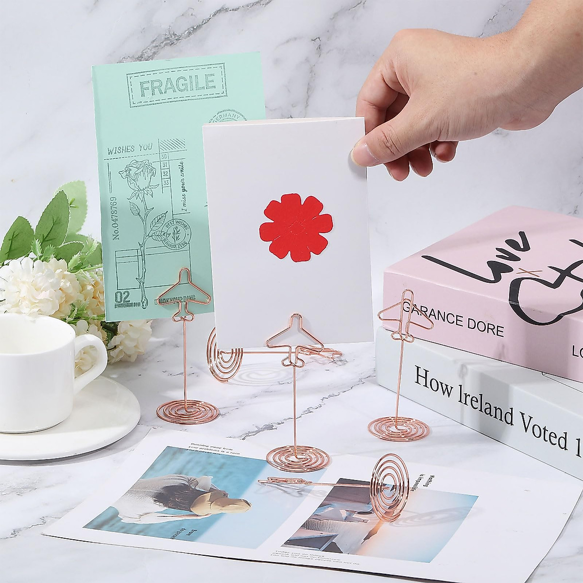 CHGCRAFT 12PCS Table Number Holders Airplane Shape Place Card Holders Metal Name Card Holders Table Number Stands Table Photo Picture Holders for Party Weddings Resturants, Rose Gold