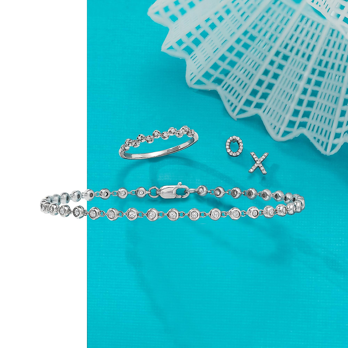 RS Pure by Ross-Simons 0.10 ct. t.w. Diamond Xo Mismatched Earrings in Sterling Silver