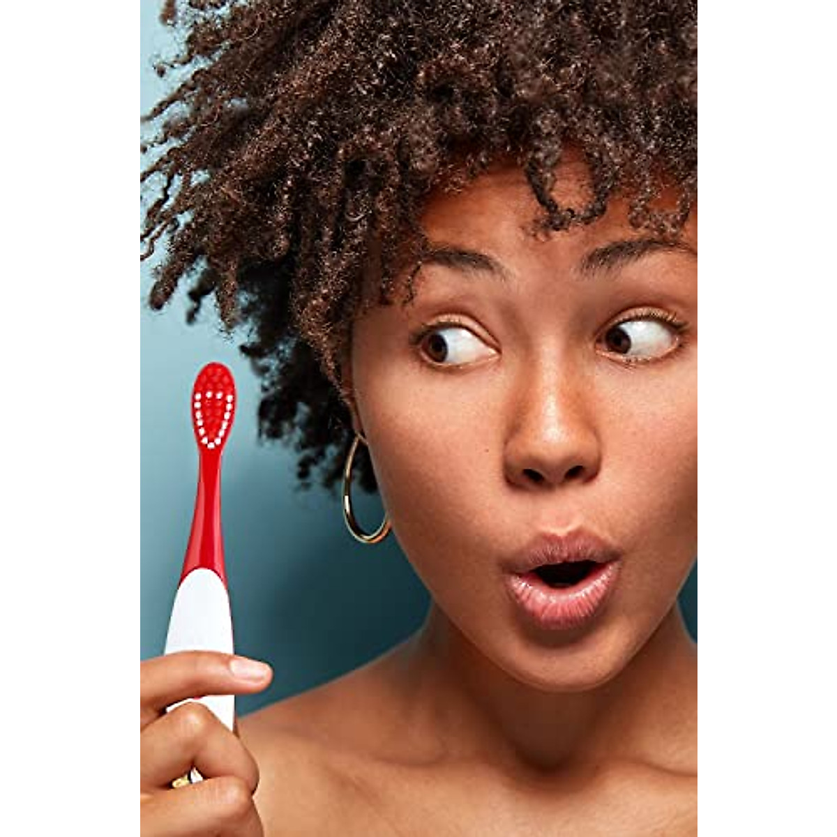 B. Designs One Direction Singing Battery Powered Tooth Brush (Live While we’re Young)/Limited Edition