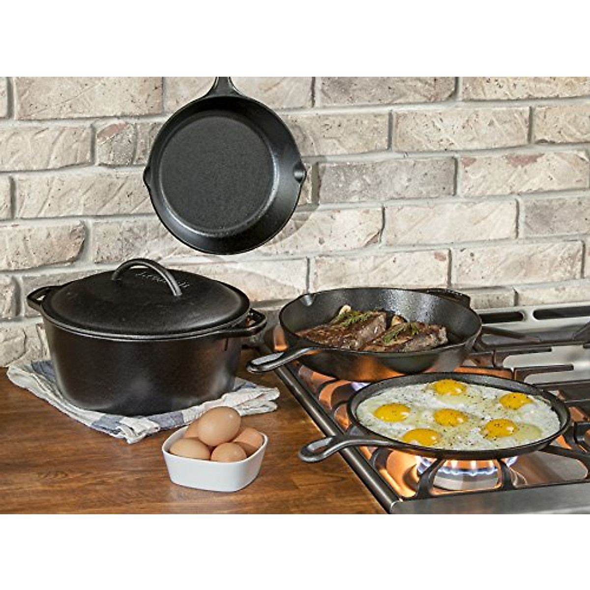 Lodge Seasoned Cast Iron 5 Piece Bundle. 10.5" Griddle, 8" Skillet, 10.25" Skillet, 10.25" Dutch Oven, and 10.25" Lid