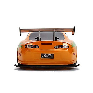 Jada Toys Fast & Furious 1:10 Toyota Supra Remote Control Car Drift Slide RC with Extra Tires 2.4GHz, Toys for Kids and Adults, Orange,black