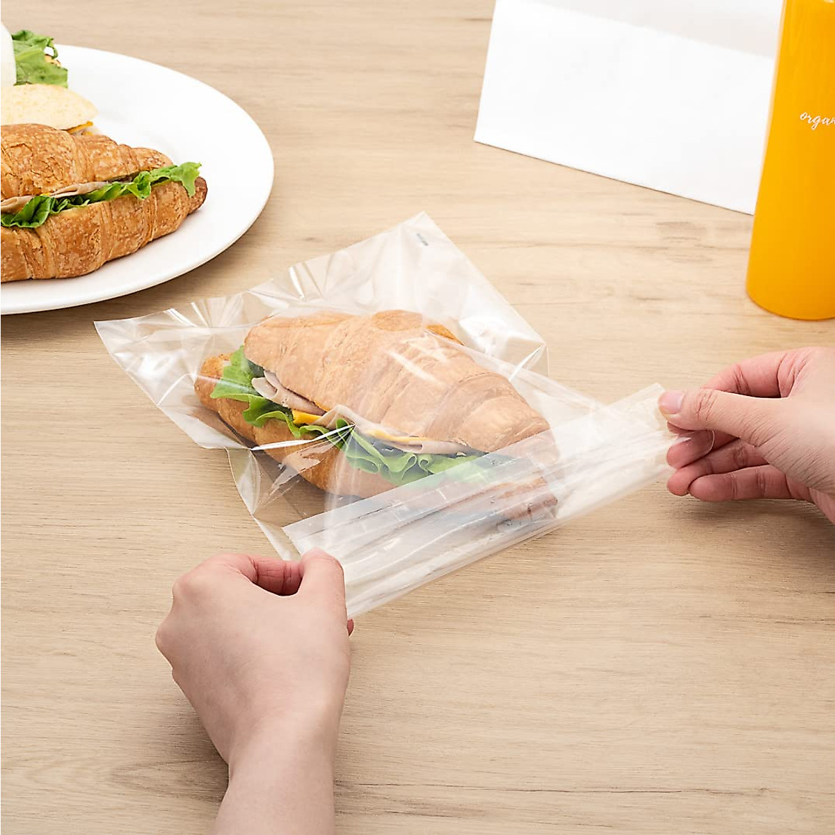 Restaurantware Bag Tek 10 x 8 Inch Treat Bags 100 Microwave-Safe Cookie Bags - Lip And Tape Design Heat-Resistant Clear Plastic Resealable Bakery Bags Grease-Resistant For Candy Nuts And Party Favors